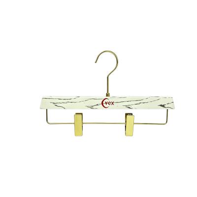 China Gold-plated non-slip plastic trouser clips with customizable color and logo for hotels and clothing stores for sale