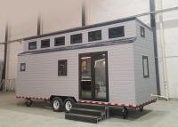 China Wheeled Light Steel Prefab Tiny House for sale