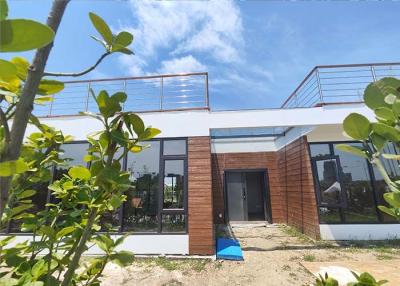 Cina Moderne case prefabbricate con sistemi di cornice in acciaio di calibro leggero Bungalow in legno per la spiaggia in vendita