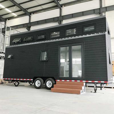 China Factory Direct Light Gauge Steel Prefabricated Tiny House On Wheels With WPC Board Wall for sale