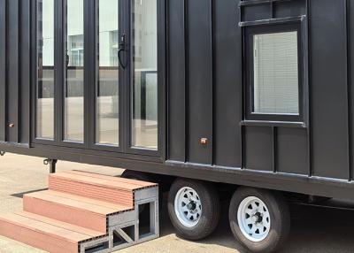 China Prefab Trailer House 2350*8000mm Steel Frame Mobile Tiny House On Wheels for sale