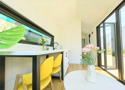 China Prefab Trailer House 2350*8000mm Steel Frame Mobile Tiny House On Wheels for sale