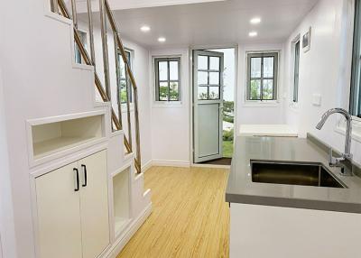 China Prefabricated Light Steel Frame Tiny House On Wheels Long Life Span Tiny Prefab Homes for sale