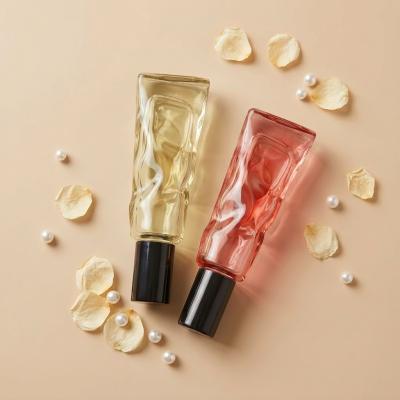 China 10ml Glass Roll on Bottles Wave Shape Empty Roller Ball Plastic Cap Perfume Oil for sale