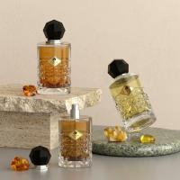 China 100ml Glass Perfume Bottles Unique Marble Pattern Geometric Cap Empty Spray for sale