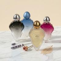 China 100ml Glass Perfume Bottle Empty Unique Irregular Shape Round Cap Crimp Neck for sale