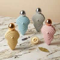 China 100ml Glass Perfume Bottle Empty Unique Irregular Shape Round Cap Crimp Neck for sale