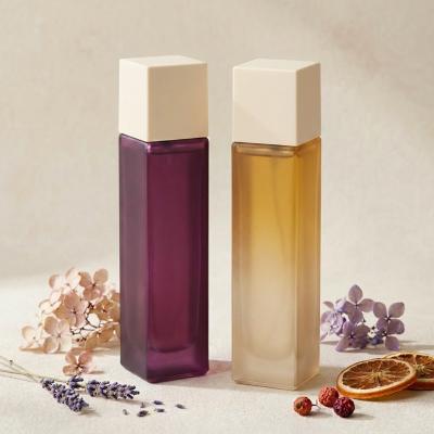China 100ml Glass Perfume Bottles Frosted Gradient Rectangle Spray Wholesale Custom for sale