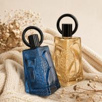 China 100ml Glass Perfume Bottles Textured Triangle Empty Ring Cap Crimp Neck Spray for sale