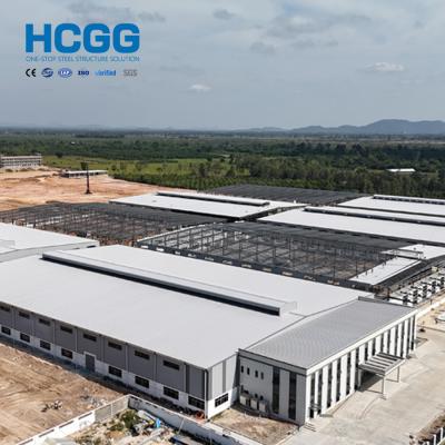 China Q235 Hot Rolled PEB Steel Warehouse With Doors Windows Custom Design Quick Install for sale