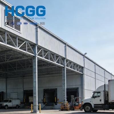 China Steel Structure Warehouse designed for easy customization allowing addition of office spaces mezzanines and loading bays for sale