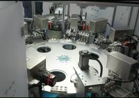 China Turntable Type Infusion Bottle Double-Fold Cap Assembly Machine for sale