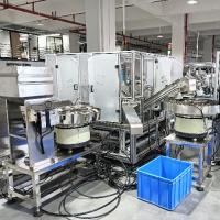 China Turntable Type Infusion Bottle Double-Fold Cap Assembly Machine for sale