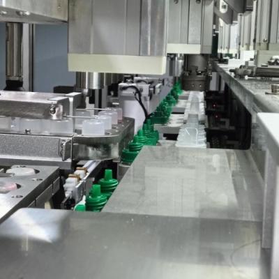 China Laundry Detergent Cap Assembly Machine For Simultaneous Assembly Of Two Sizes Of Products for sale