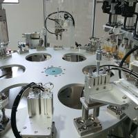 China Automatic Assembly Machine For Moisture-proof Cover Controlled By PLC Turntable Type Operation for sale