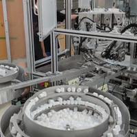 China Silica Gel Desiccant Cap Assembly Machine Stable Performance Plc Control Remote Control for sale