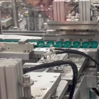 China Cap Folding Machine With Screwing Machine Configuration Of Sever Motor And No High Technical Requirement For Operator. for sale