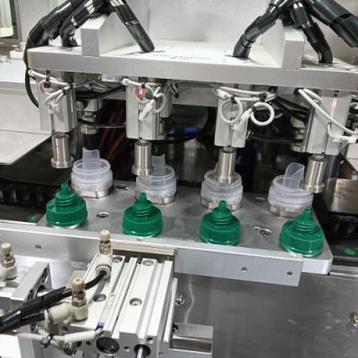 China High Accuracy Servo Motor Driven Laundry Detergent Cap Assembly Machine with 99% Qualified Rate for sale