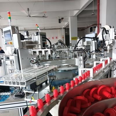 중국 자동 소변 컵 조립 기계, 지표 운동 작동 및 안정성을 향상시키기 위해 진동 피더 로딩을 특징으로합니다. 판매용