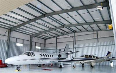 China Custom ASTM Large Span Steel Structure Factory Warehouse Building Shed Hangar for sale