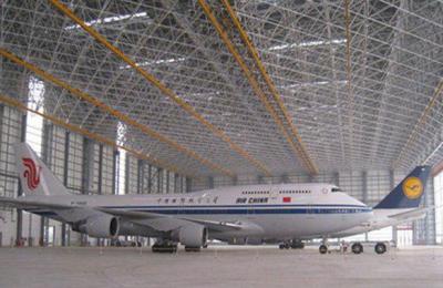 China Custom ASTM Large Span Steel Structure Factory Warehouse Building Shed Hangar for sale