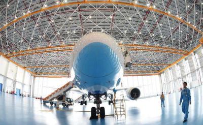 China Custom ASTM Large Span Steel Structure Factory Warehouse Building Shed Hangar for sale