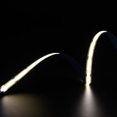Cina 10W/M FCOB 8mm 480LEDs/M COB Reel To Reel LED Strip Light Alta densità FOB Illuminazione a nastro lineare in vendita