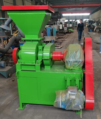 China Oval round shape charcoal dust twin roller charcoal briquette making machine for sale