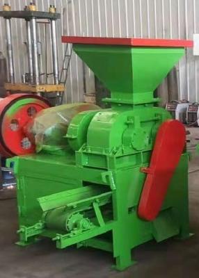 China Oval round shape charcoal dust twin roller charcoal briquette making machine for sale