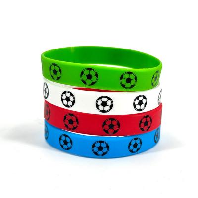 China Embossed Silicone Bracelets Custom Soccer Ball Game Souvenir Gift Wrist Bands in Various Colors for sale
