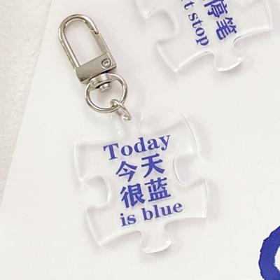 China 2mm Thickness Transparent Acrylic Keychain Metal Ring Customized Design Acrylic Letter Keychain for sale
