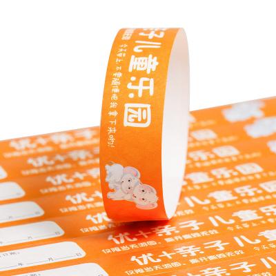 中国 オーダーメイドのタイベック紙 祭典イベント印刷用の防水腕帯 販売のため