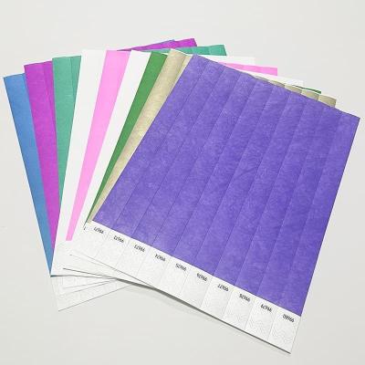 中国 Snap Closure Tyvek Paper Wristbands Custom Logo Printing for Event Identification and Branding 販売のため