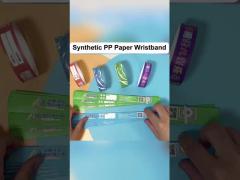Bolsa de venta personalizada de pulseras de papel PP para eventos con patrón de logotipo de palabra código de barras pulsera de regalo promocional