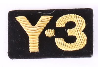 China Machine Made Embroidered Name Badges Iron On Embroidered Logo Patches for sale