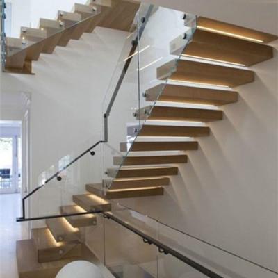 China Lowest cost thick solid wood stair treads glass railing floating staircase for sale