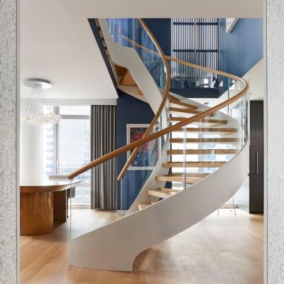 China Wood Open Riser Curved Staircase For Building With High Quality for sale