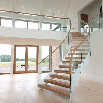 China Modern Disgn Wood Open Riser Curved Staircase For Building for sale