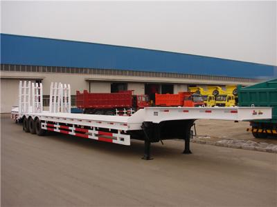 China Truck trailer supplier 3 axles low bed semi trailer with winch for machinery transport for sale
