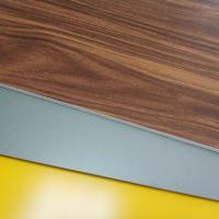 China Circular Cladding Wood Grain Aluminum Composite Panel Embossed Surface Density 2.5% for sale