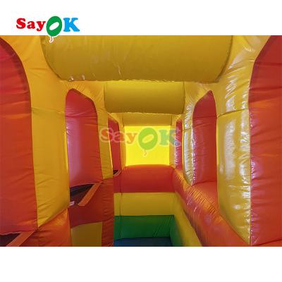 China Buitenopblaasbare glijbaan eenvoudige pvc opblaasbare uitschuiver glijbaan blaas op commerciële glijbaan met vijver voor kinderen Te koop