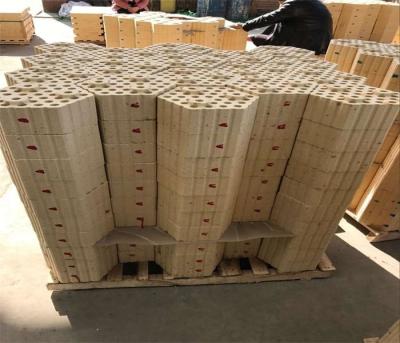 Cina 12 mattoni di argilla refrattaria del controllore dei fori, mattone refrattario d'isolamento della grata per la stufa di corrente d'aria calda in vendita