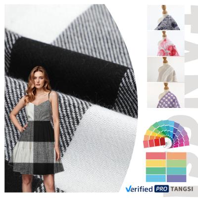 China Shaoxing Textile Material Brushed Pure Polyester Yarn Dyed 12N*12N Fabric Blackout Feature for Fashion Clothes for sale