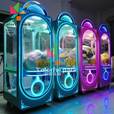 中国 私たちのカラフルな直接爪クレーンアーケードゲームマシンで勝利のスリルを体験してください 販売のため