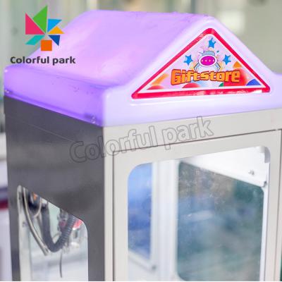 Cina Divertimento all'interno orsetto di peluche moneta gestito giocattolo arcade mini macchina a artigli per i centri di gioco in vendita