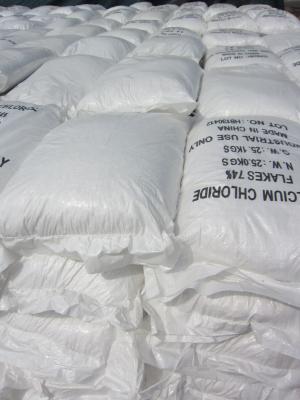 China calcium chloride flake 74%min used in waste treatment for sale