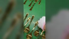 Stainless steel tableware with vacuum-coated golden film