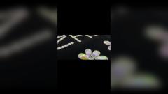 Jewelry with iridescent water droplet effect
