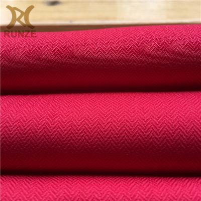 China 150D*150D Rode golvende weefsel geweven haringbeenstof voor rugzakken en jassen met een middengewicht Te koop