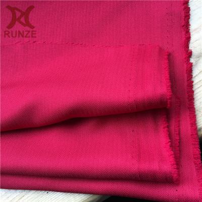 China 150D*150D Rode golvende weefsel geweven haringbeenstof voor rugzakken en jassen met een middengewicht Te koop